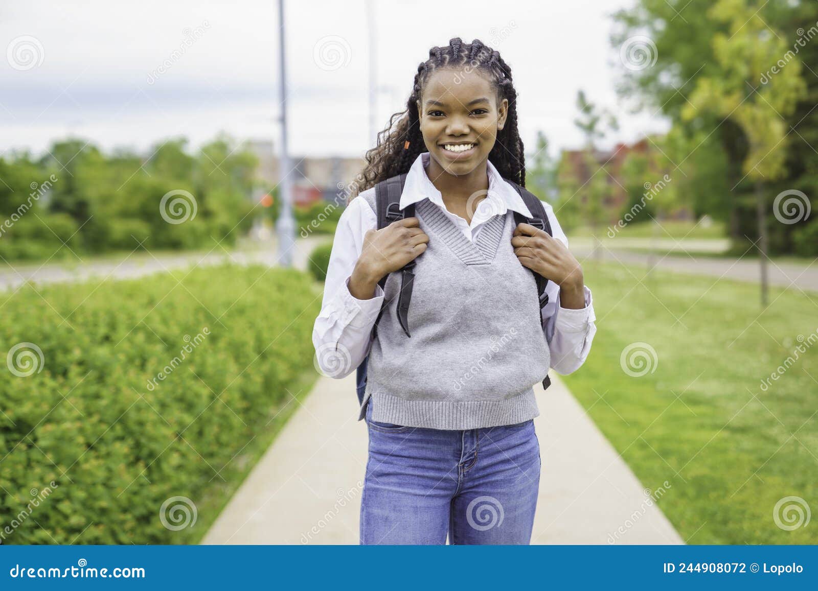 Cute Black Female University Student on Campus with Backpack Stock ...