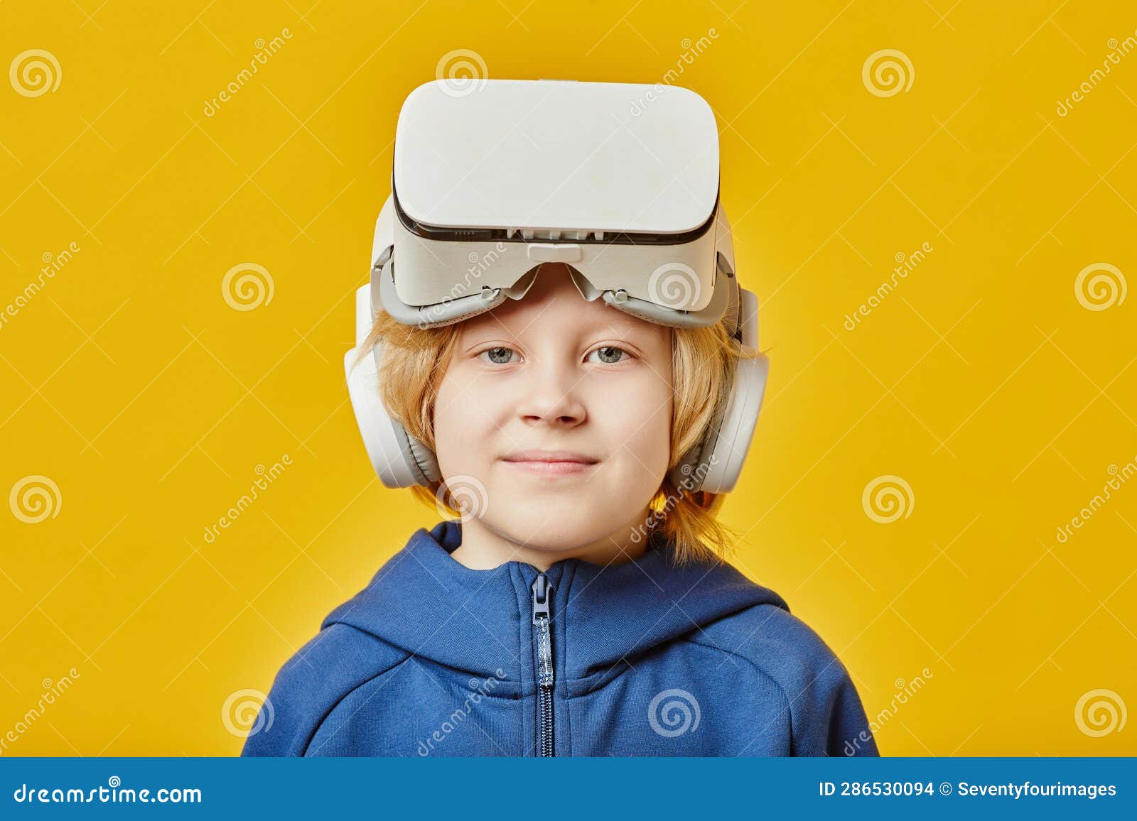 Cute Blond Boy with VR Headset on Forehead Looking at Camera Stock ...