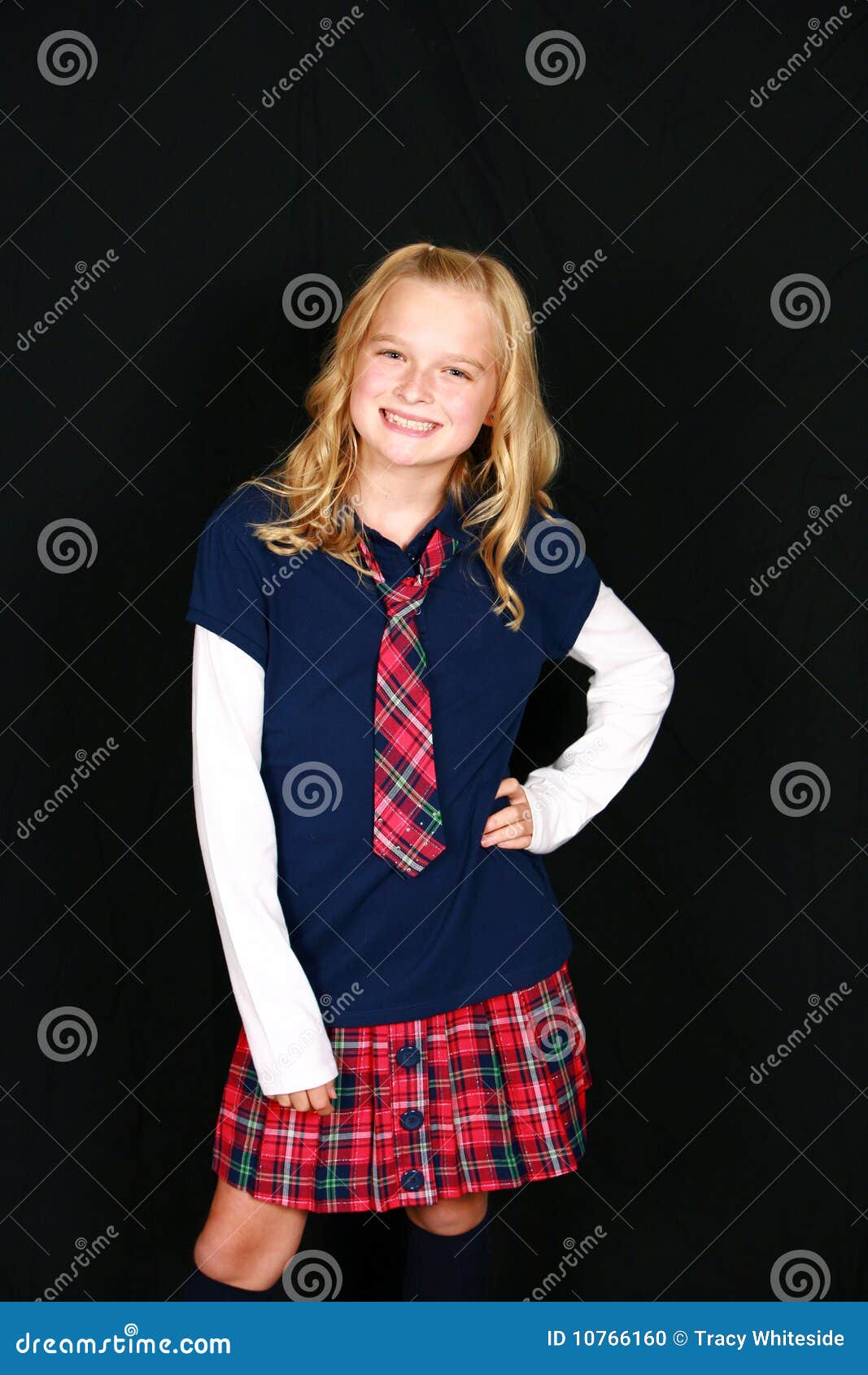 Cute blond girl in plaid stock photo. Image of children - 10766160