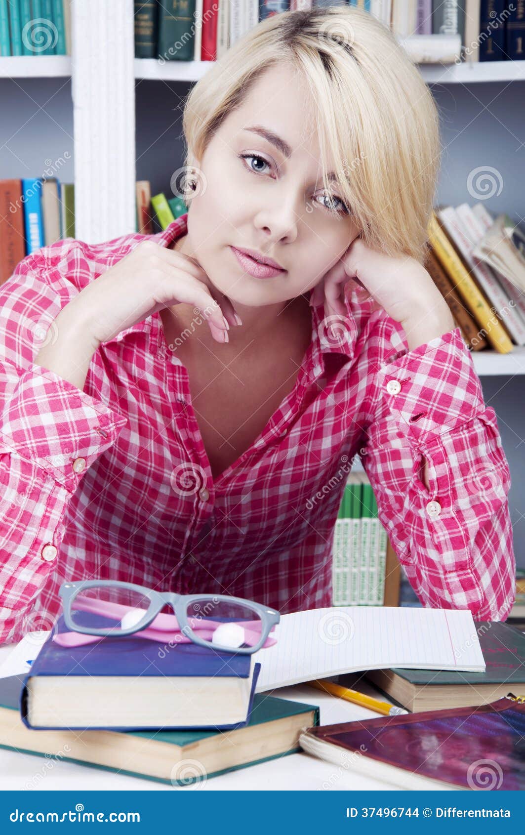 Cute blonde student girl stock photo. Image of bookshelf - 37496744