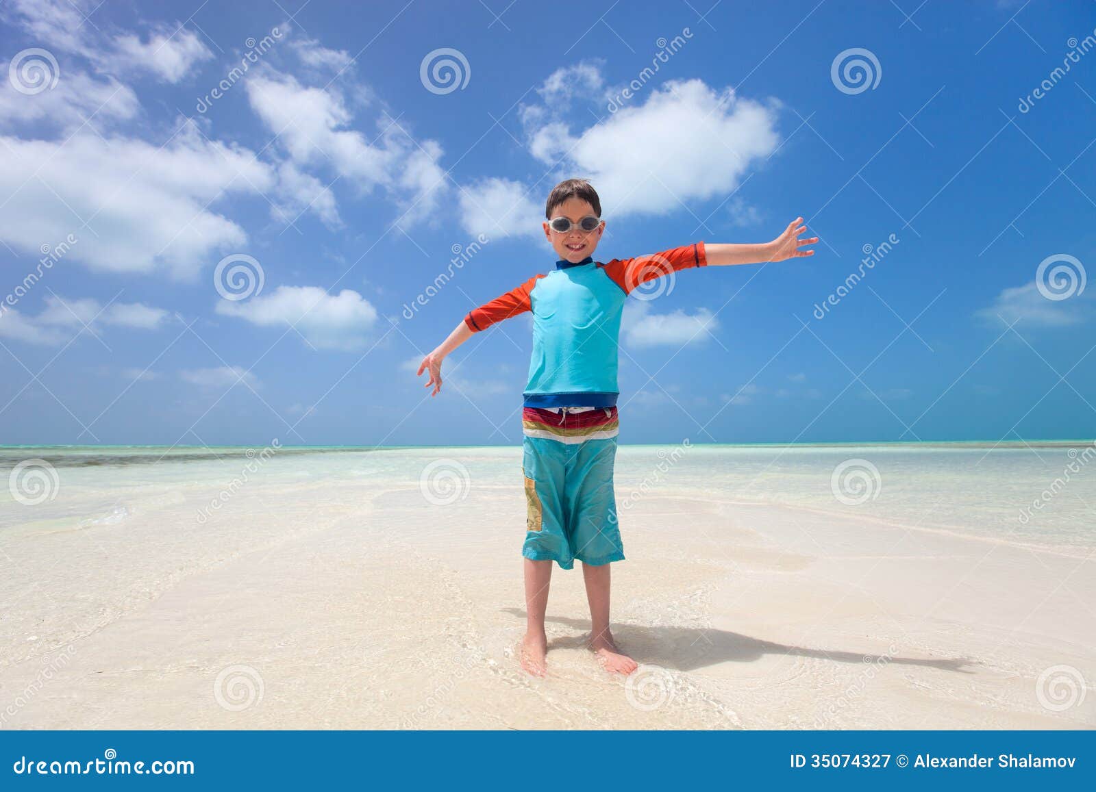 Cute boy at beach stock image. Image of emotion, playful - 35074327