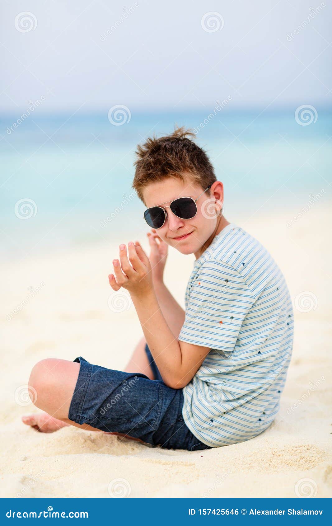 Cute boy at beach stock photo. Image of turquoise, seascape - 157425646
