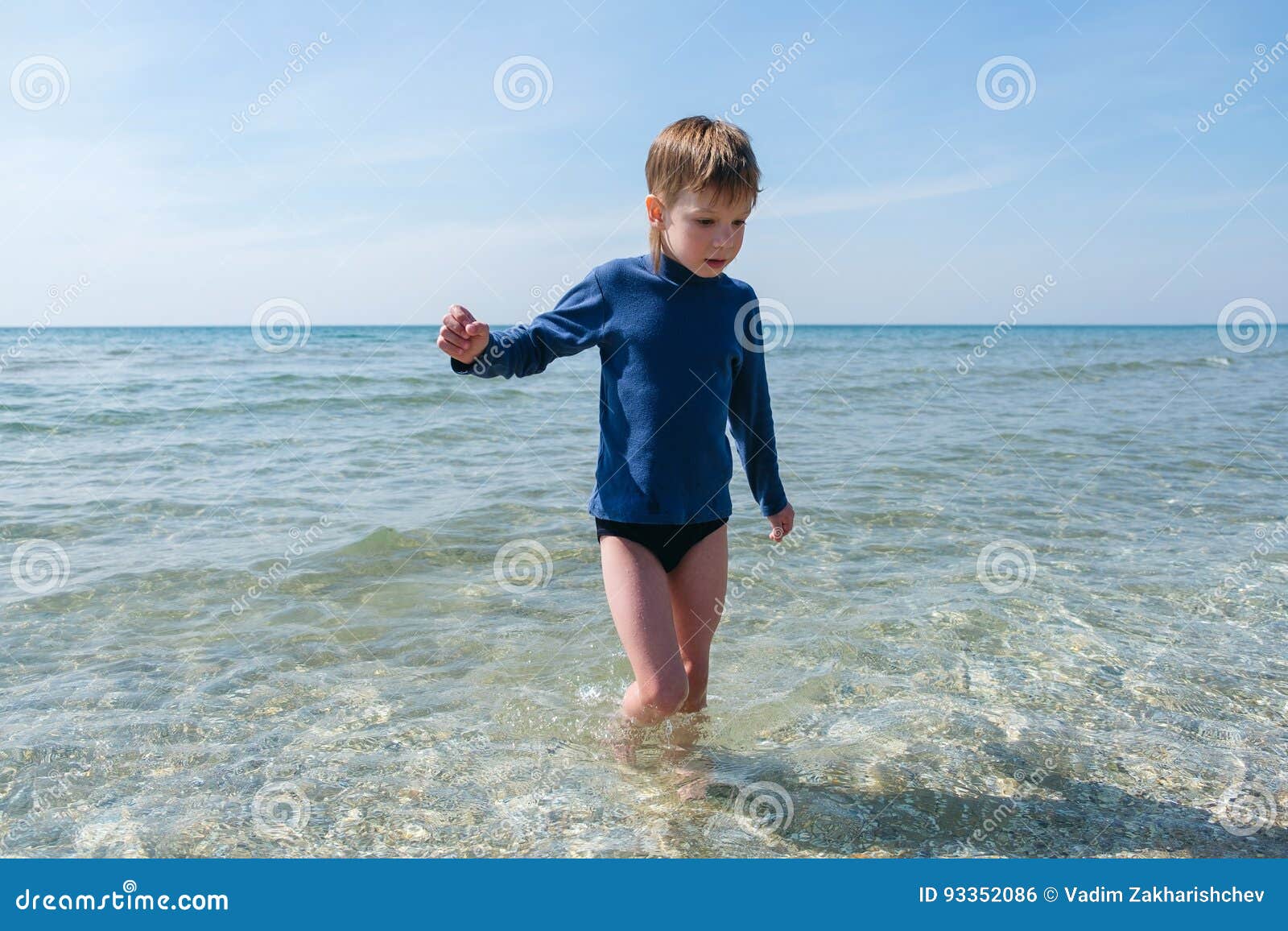 Cute boy on beach of sea stock photo. Image of beach - 93352086