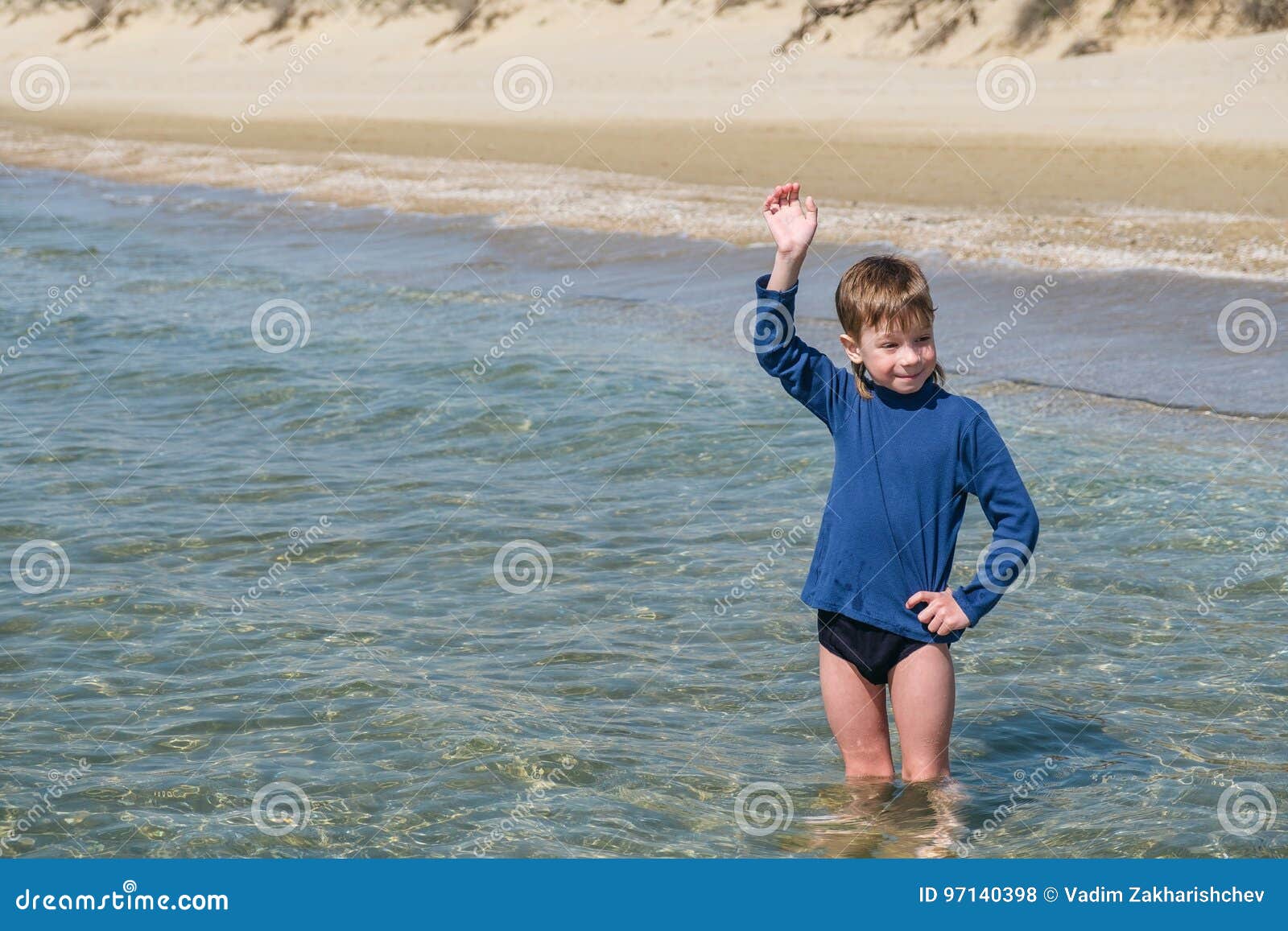 Cute boy on beach of sea stock photo. Image of healthy - 97140398