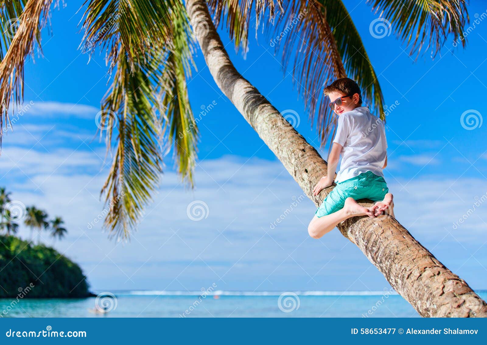 Cute boy on beach vacation stock image. Image of rarotonga - 58653477
