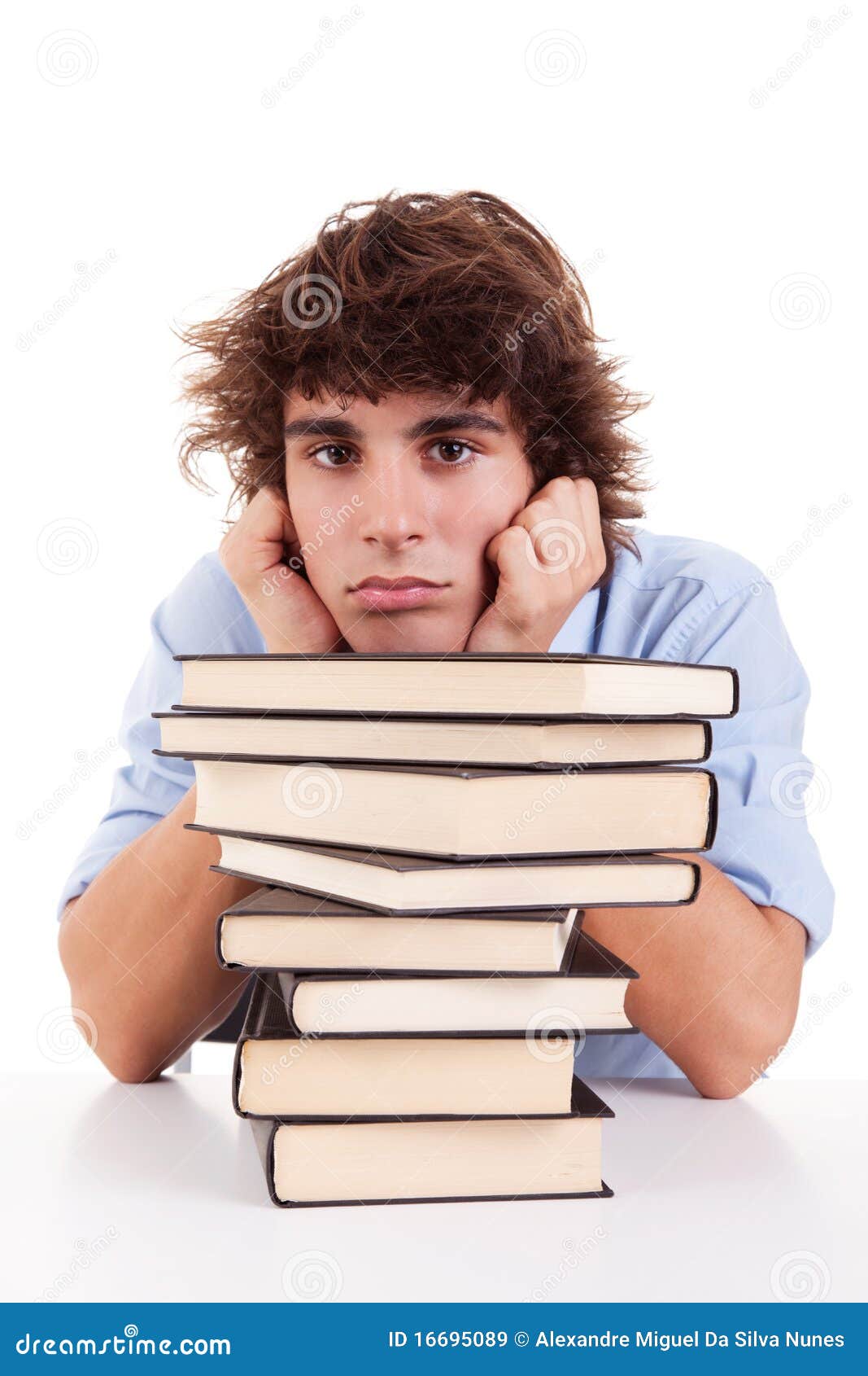 Cute Boy Bored, among Books, on His Desk Stock Image - Image of male ...