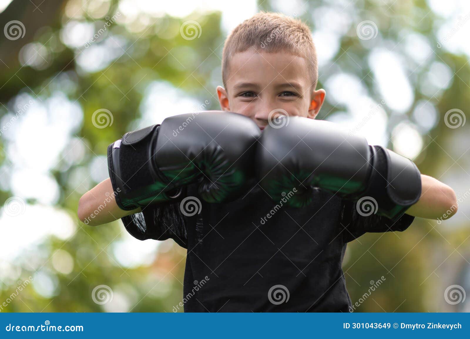 Cute Boy in Boxing Gloves Looking Contented and Excited Stock Image ...