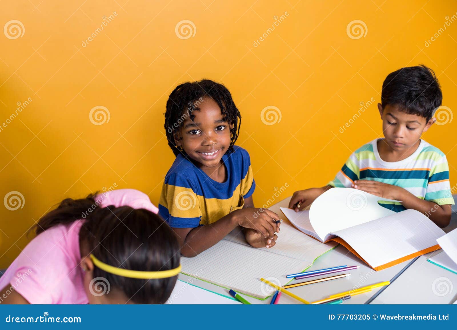 Cute boy with classmates stock image. Image of education - 77703205