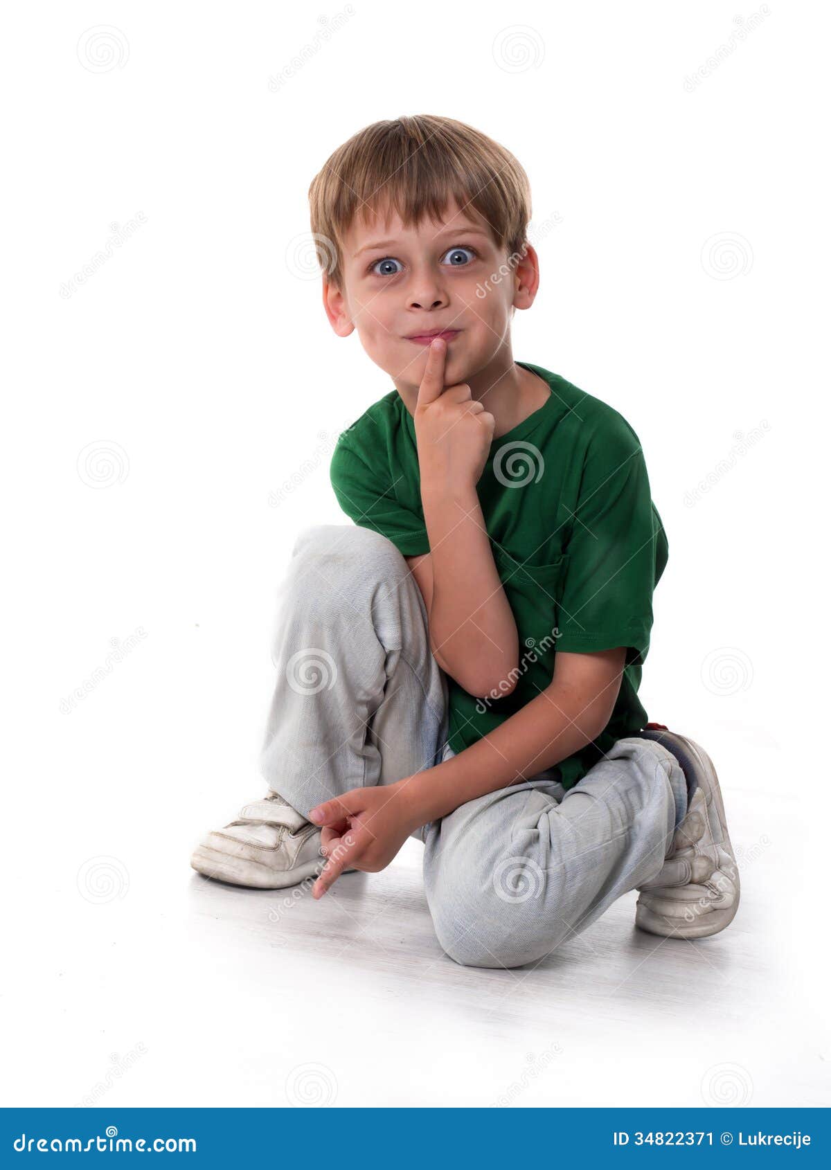 Cute Boy Crouching on the Floor Stock Image - Image of youth, sport ...