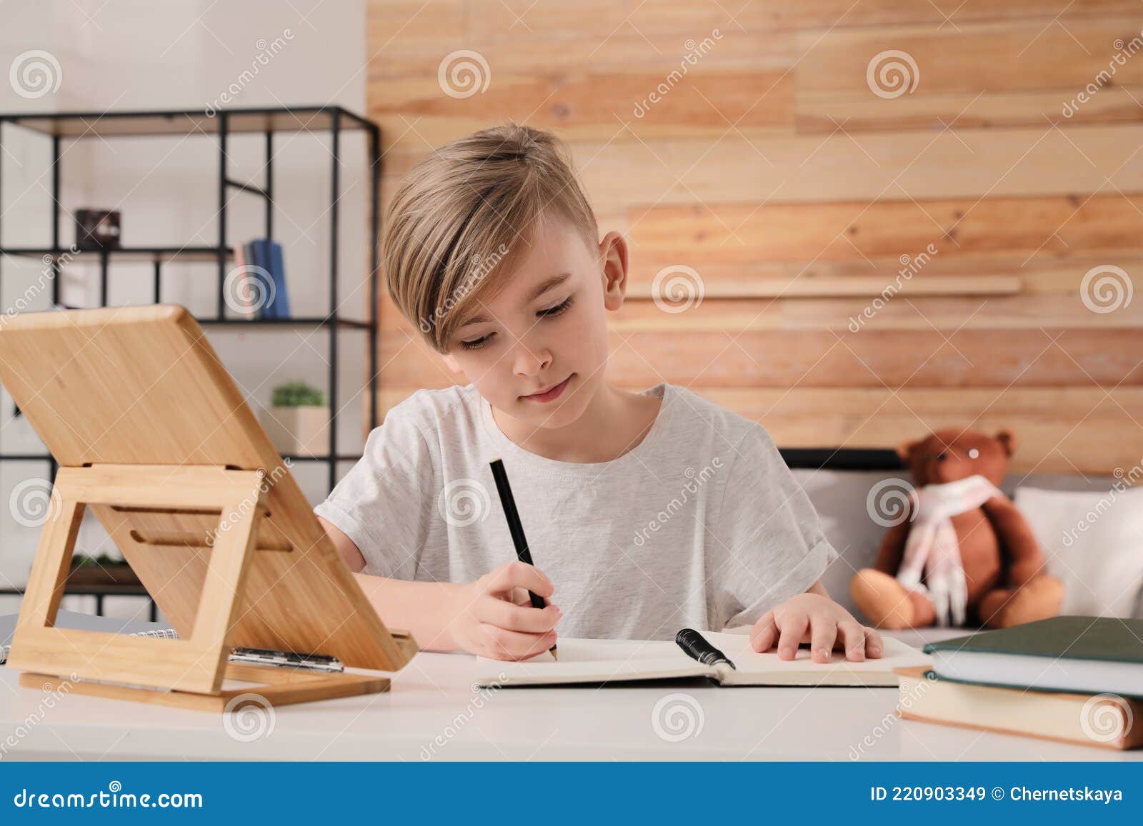 Cute Boy Doing Homework at Table Stock Image - Image of knowledge, cute ...