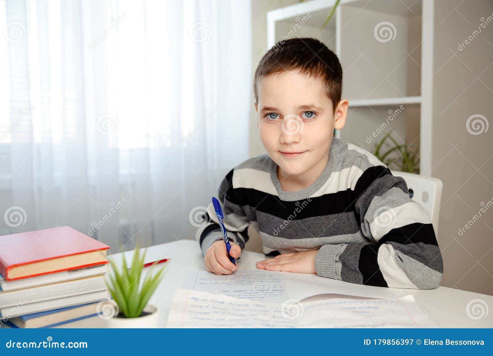 Cute Boy is Doing Math Homework. Stay at Home. Stay Safe. Coronavirus ...