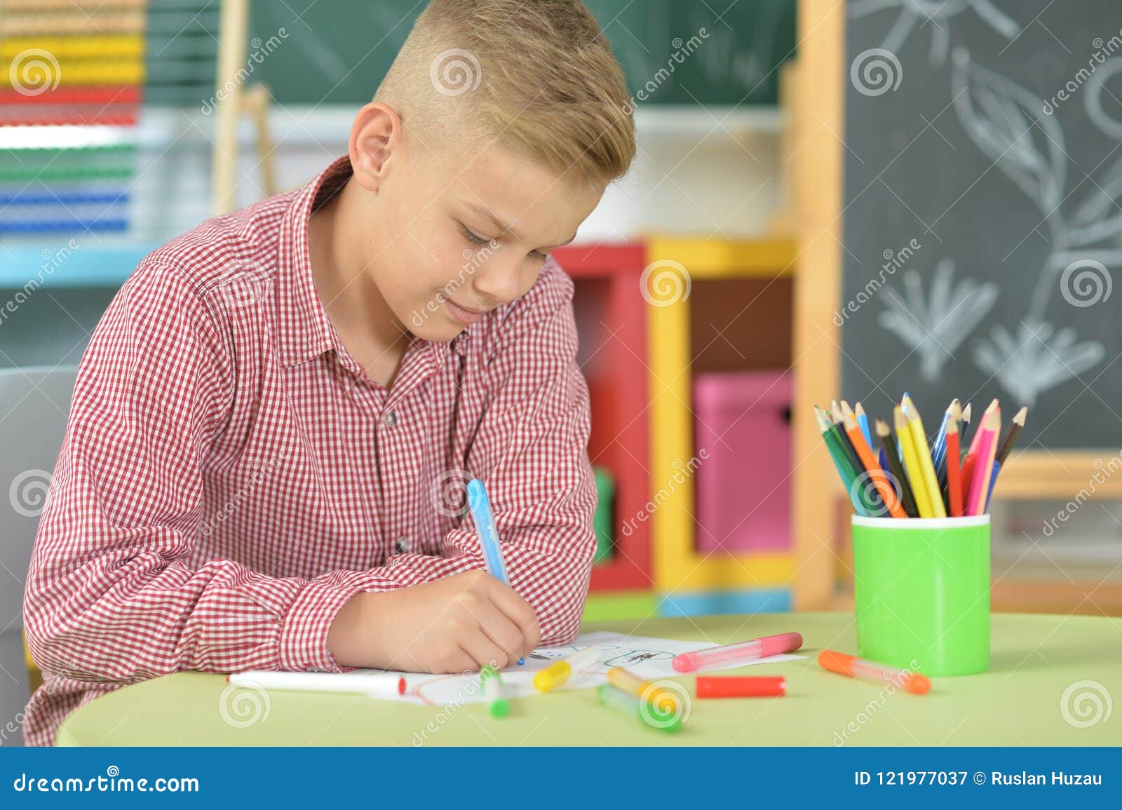 Cute boy drawing stock image. Image of energy, elementary - 121977037