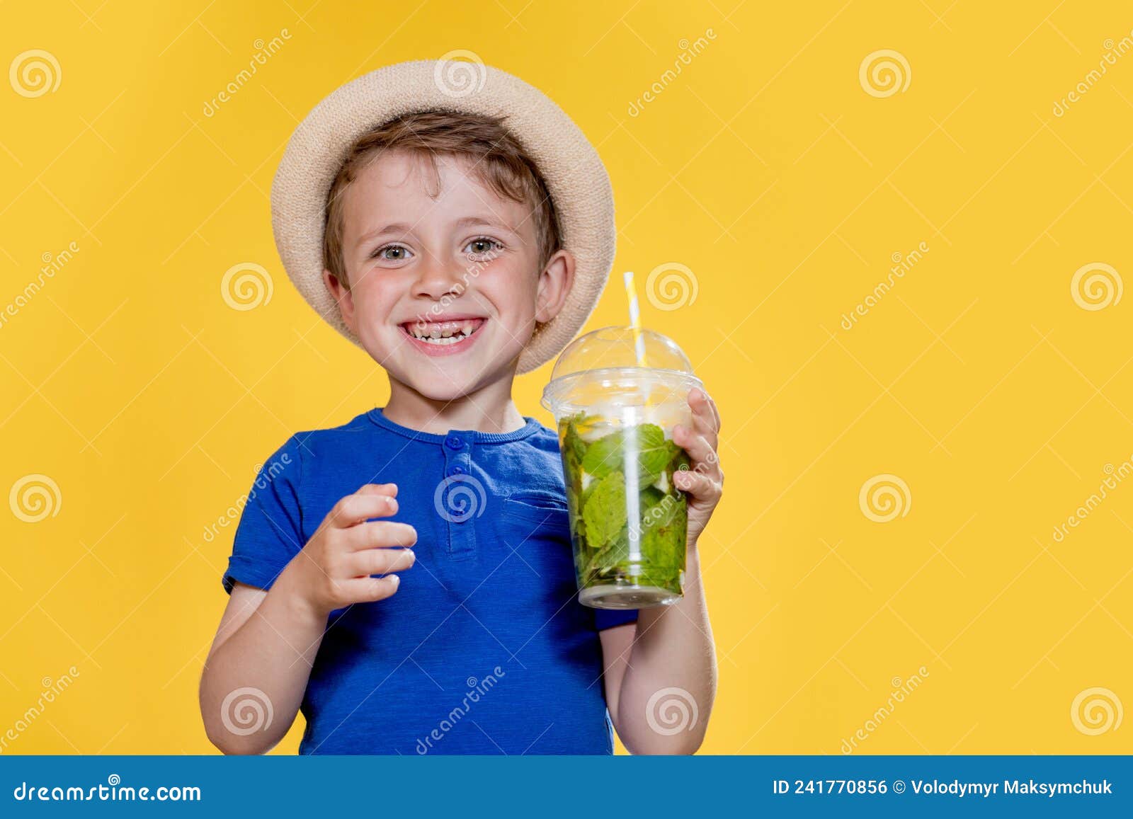 Cute Boy Drink Mojito Cocktail from Plastic Cup Over Yellow Studio ...