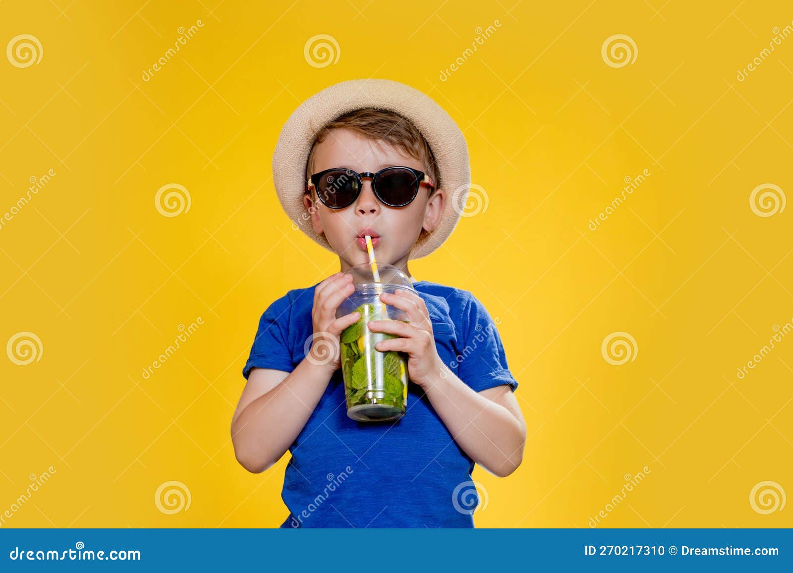 Cute Boy Drink Mojito Cocktail from Plastic Cup Over Yellow Studio ...