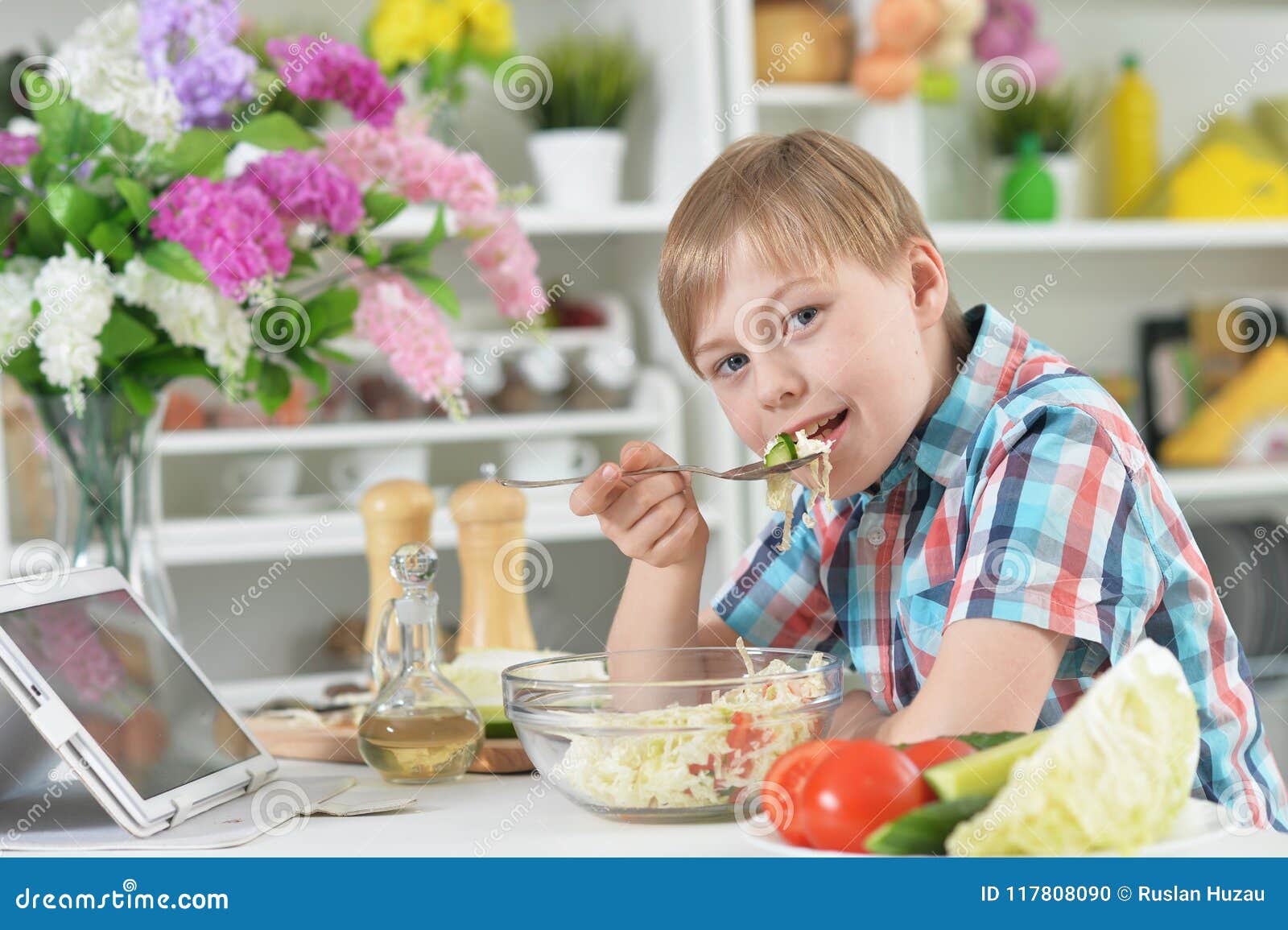 Cute Boy Eating Healthy Salad Stock Photo - Image of making, childhood ...