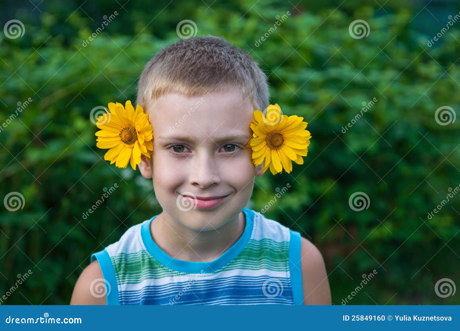 Cute Boy with Flowers on Ears Having Fun Stock Photo - Image of ...