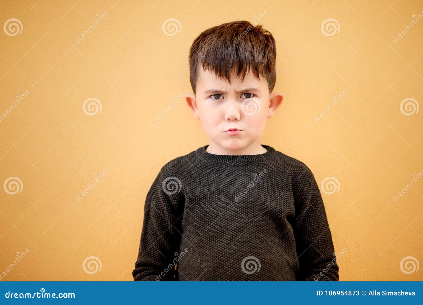 Cute boy with a grumpy stock image. Image of furious - 106954873