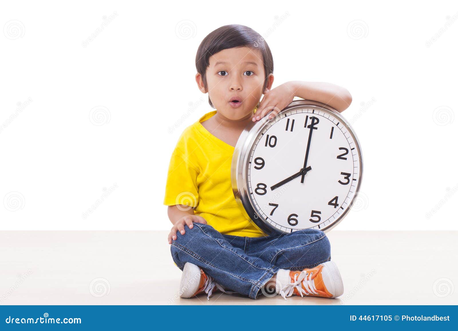 Cute boy holding clock stock image. Image of asian, alarm - 44617105
