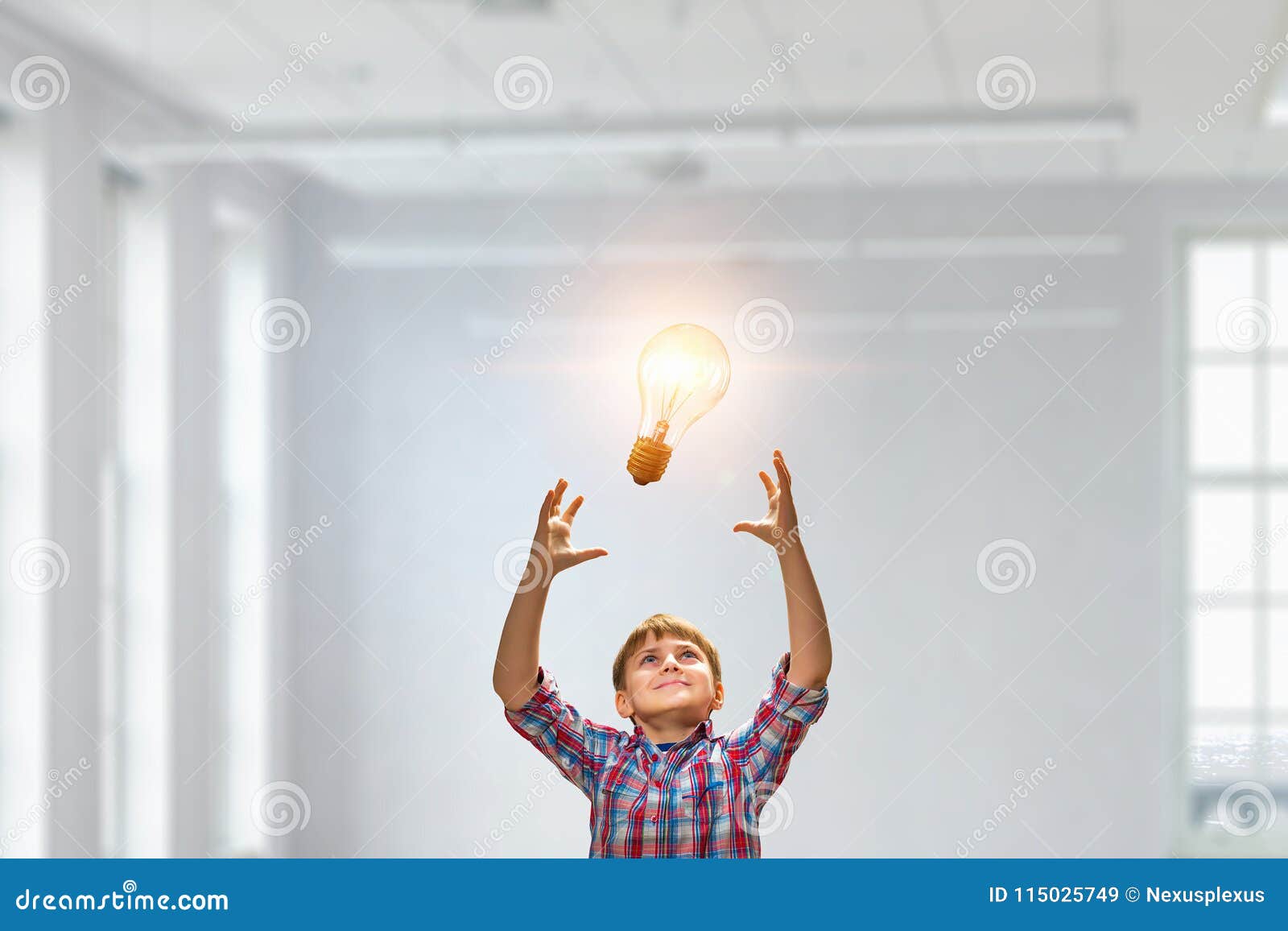 Boy Catch Light Bulb. Mixed Media Stock Image - Image of handsome ...