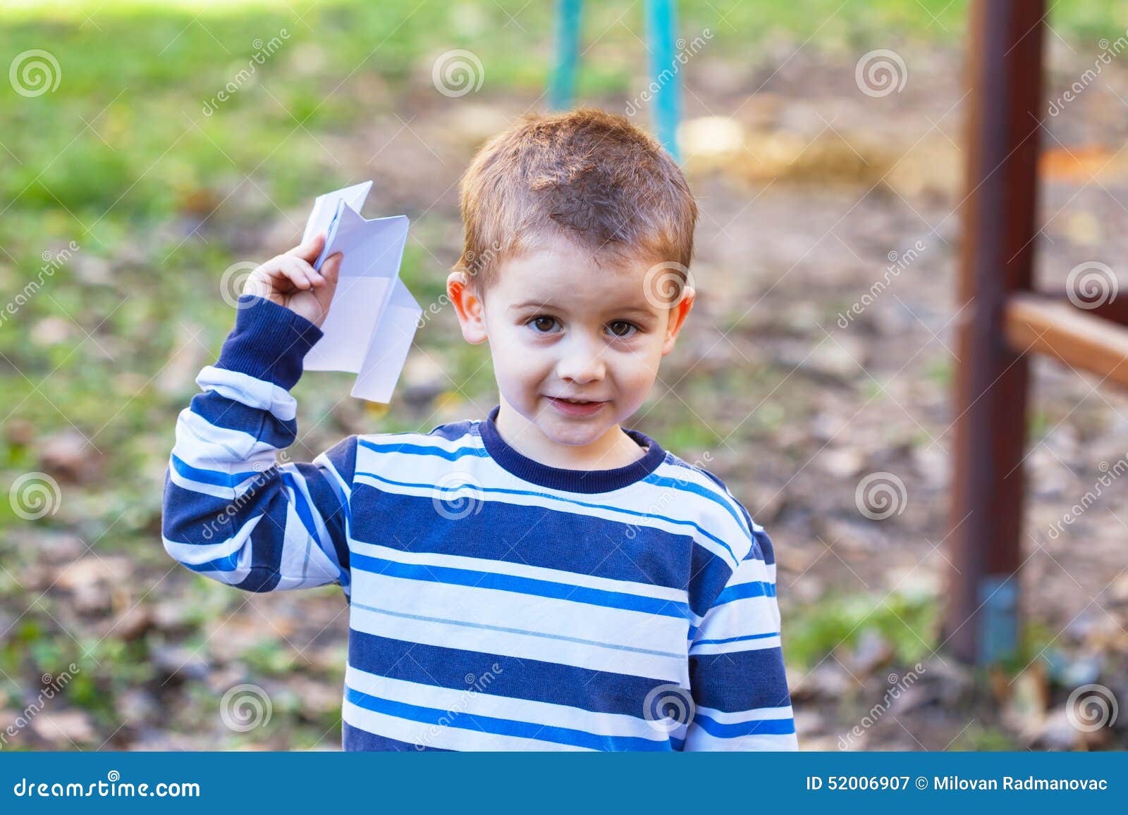 Cute Boy Holding a Paper Airplane Stock Image - Image of smiling ...