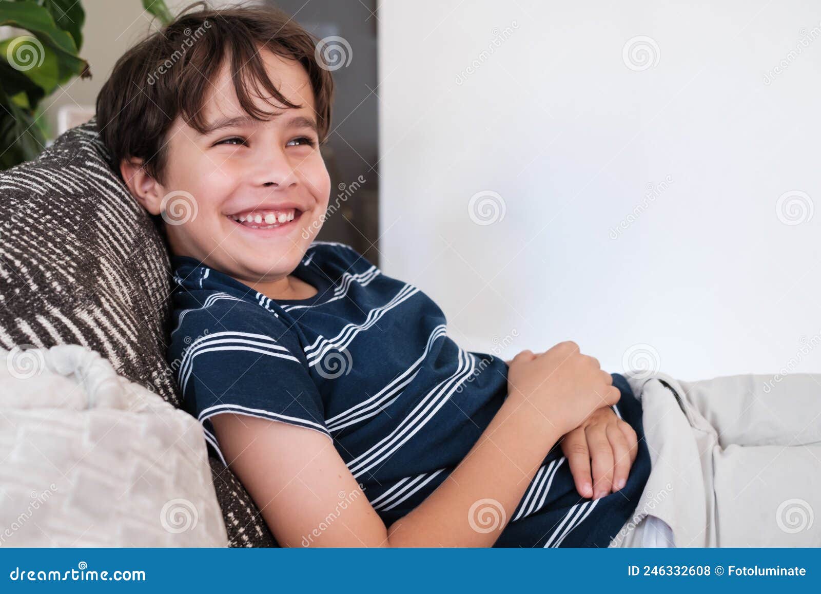 Cute boy at home stock photo. Image of lifestyle, brown - 246332608