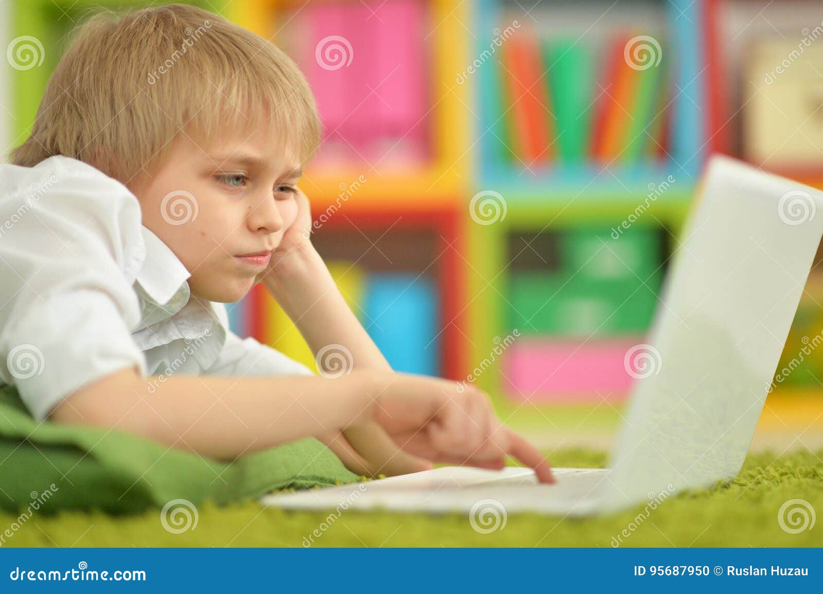 Cute boy with a laptop stock photo. Image of happy, smiling - 95687950