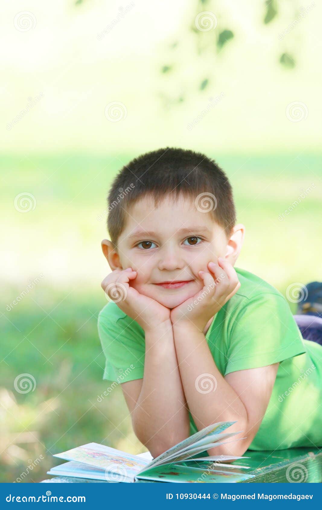 Cute Boy Laying Down on Bench Stock Photo - Image of laying, young ...