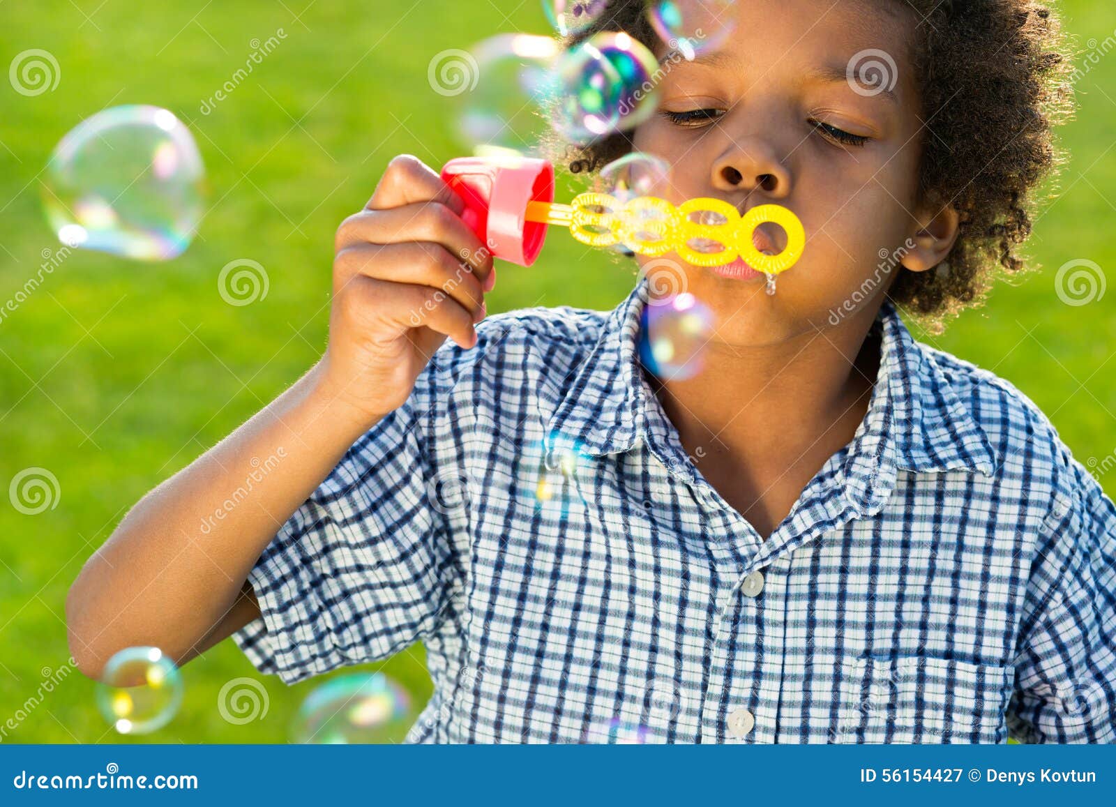 Cute Boy is Making Bubbles. Stock Image - Image of forest, bubble: 56154427