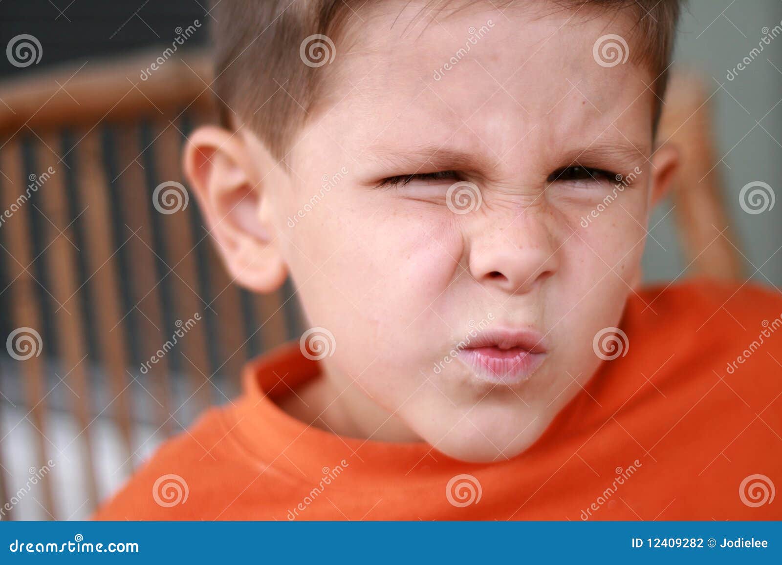 Cute Boy Making a Cheeky Grin Stock Photo - Image of cute, baby: 12409282