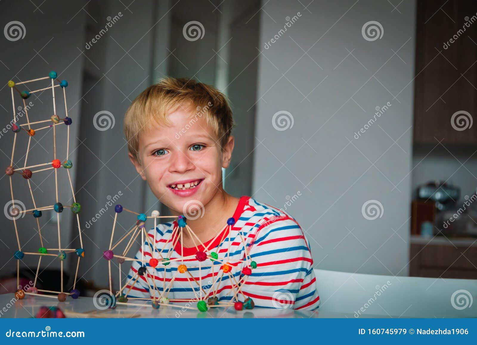 Cute Boy Making Geometric Shapes, Engineering and STEM Stock Image ...