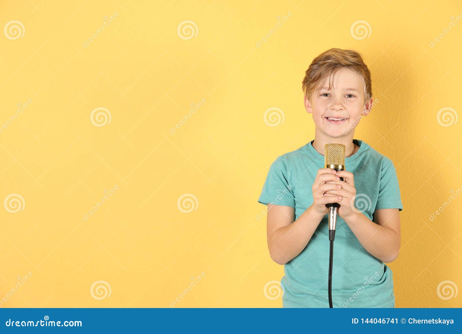 Cute Boy with Microphone on Color Background Stock Image - Image of ...
