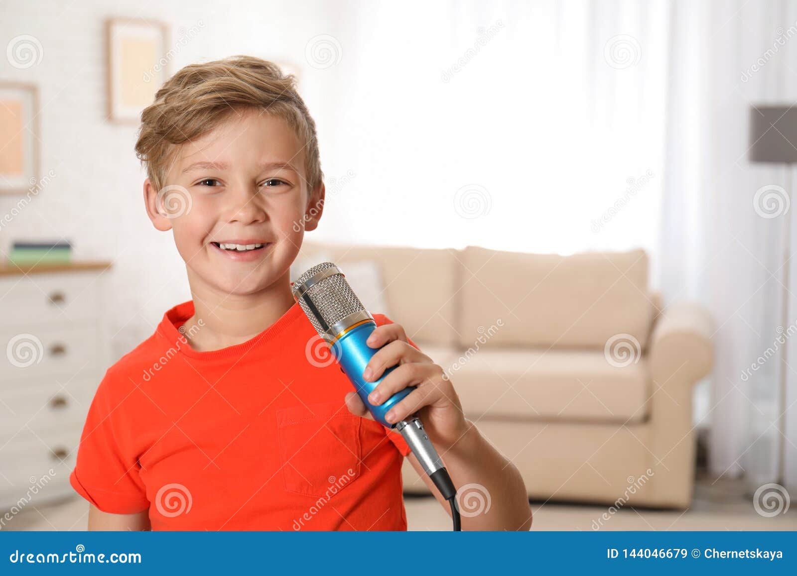 Cute Boy with Microphone in Room Stock Image - Image of home, happy ...