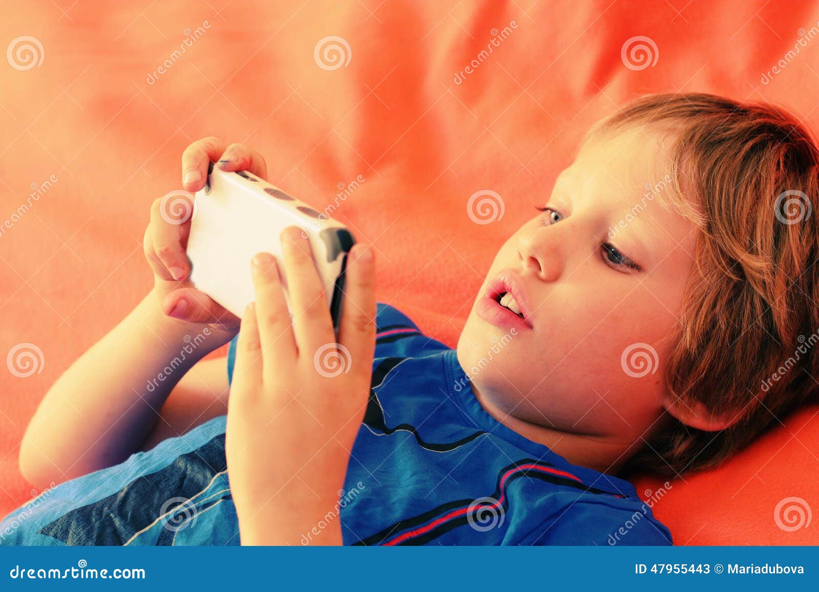 Cute boy with mobile phone stock image. Image of hands - 47955443