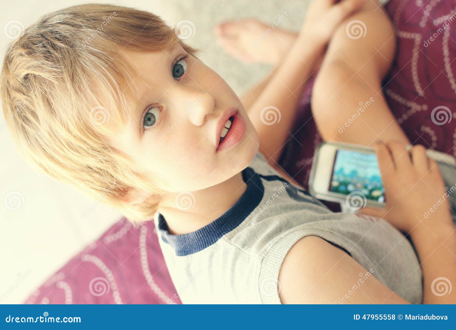 Cute boy with mobile phone stock photo. Image of curiosity - 47955558