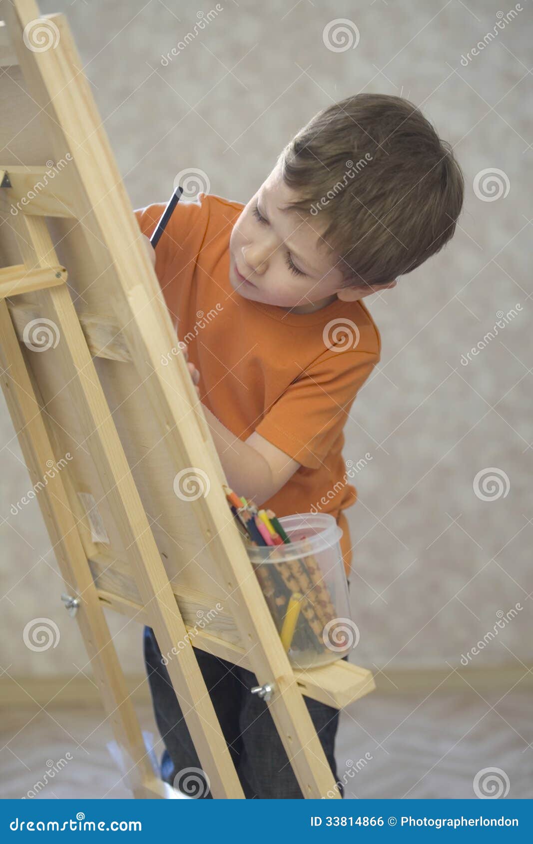 Cute Boy Painting on Canvas Stock Photo - Image of concentration ...