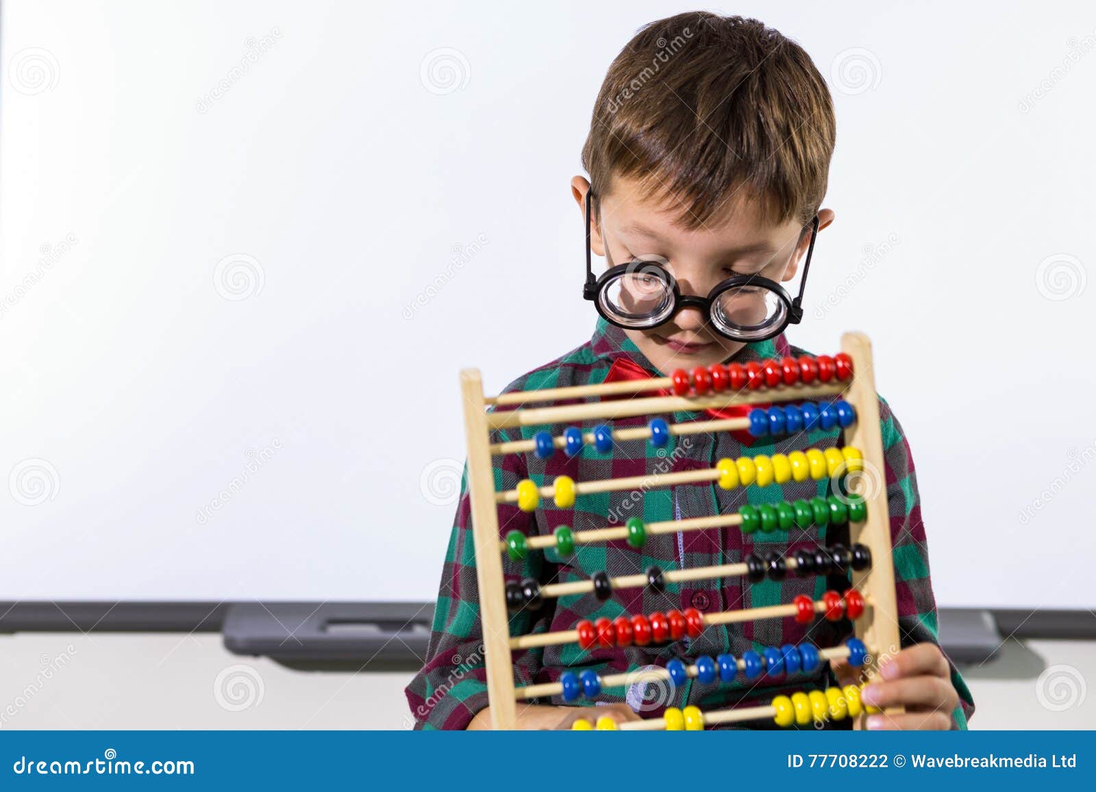 Cute Boy Playing with Abacus in Classroom Stock Photo - Image of length ...