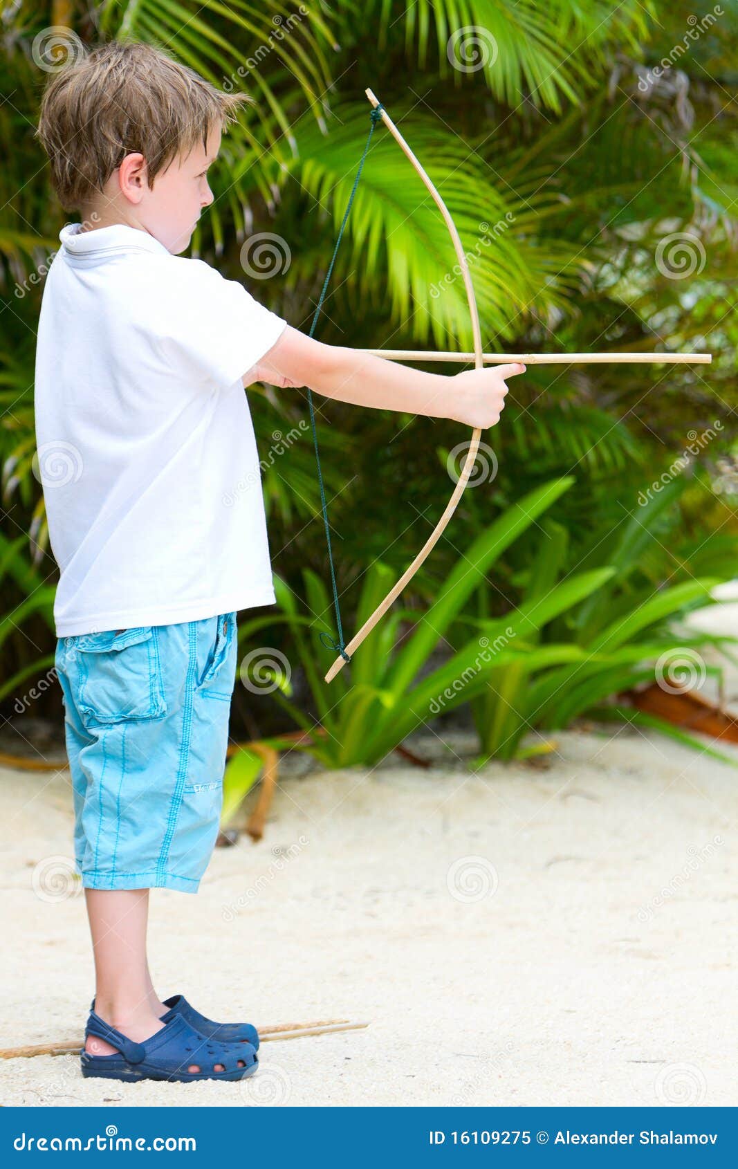 Cute Boy Playing with Bow and Arrows Stock Image - Image of closeup ...