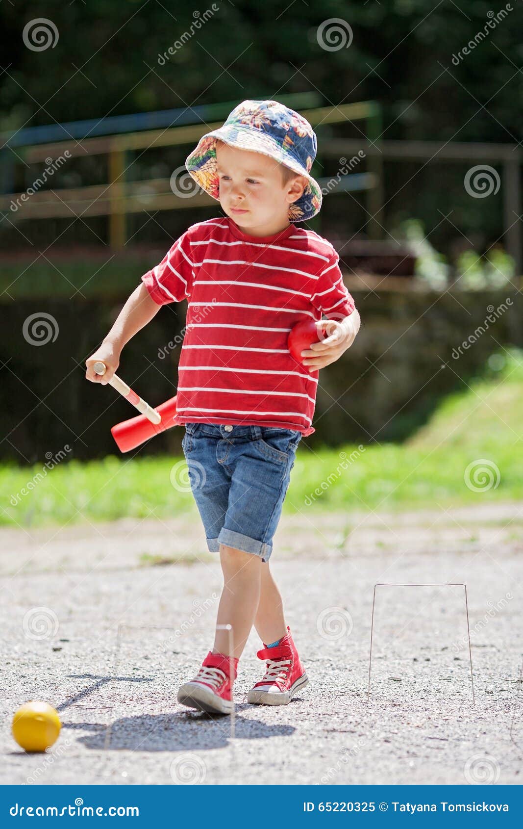 Cute boy, playing croquet stock image. Image of croquet - 65220325
