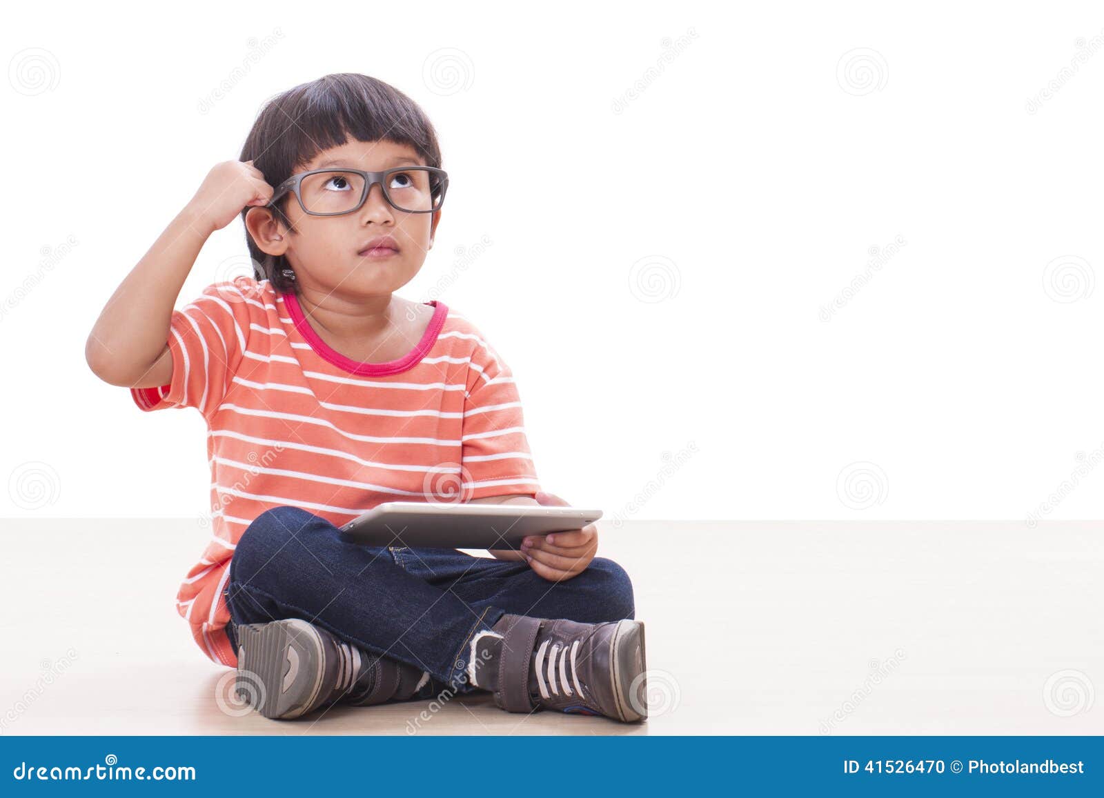Cute boy playing a game stock photo. Image of notebook - 41526470