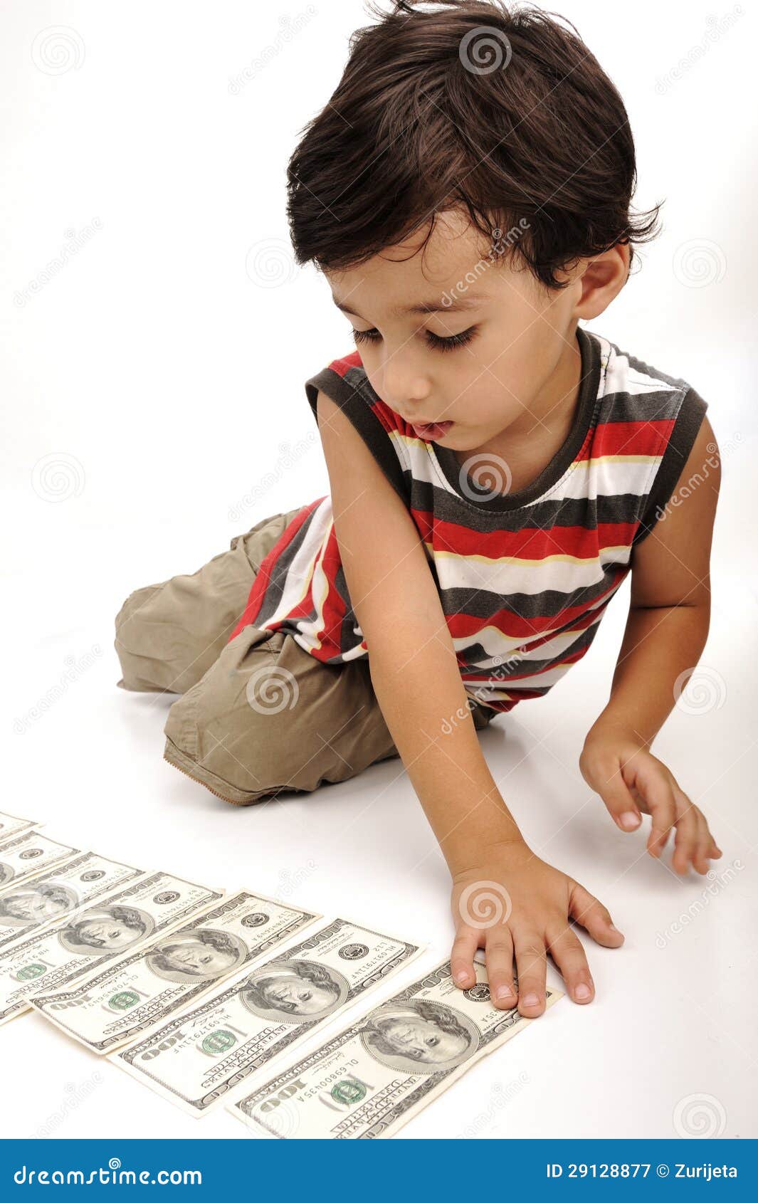 Cute boy plays with money stock image. Image of child - 29128877