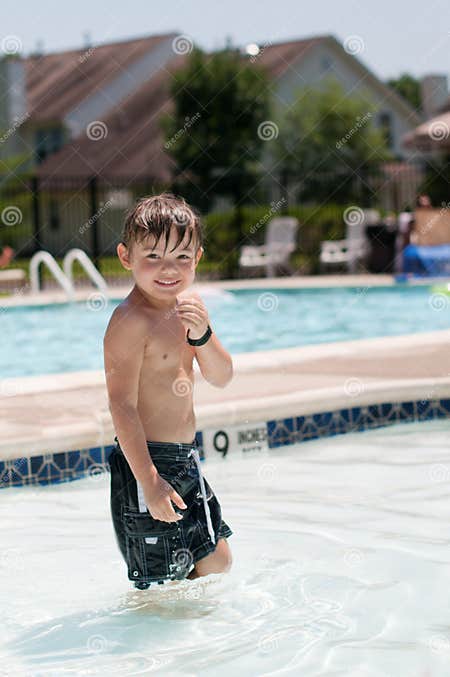 Cute boy in pool stock photo. Image of activity, kiddy - 23939134