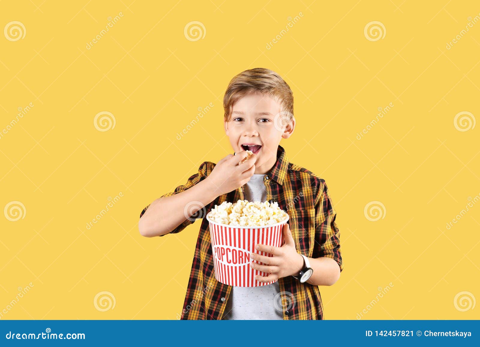 Cute Boy with Popcorn Bucket Stock Image - Image of background ...