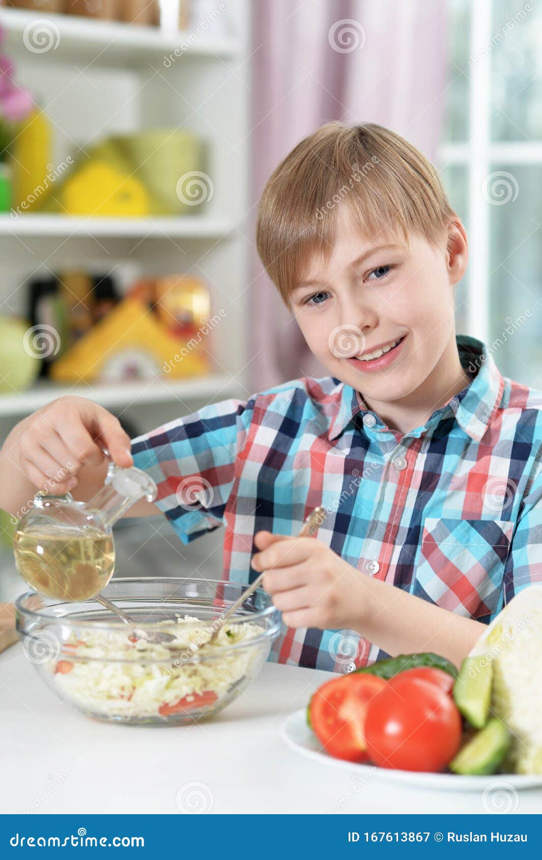 Cute Boy Preparing Salad on Kitchen Table at Home Stock Image - Image ...