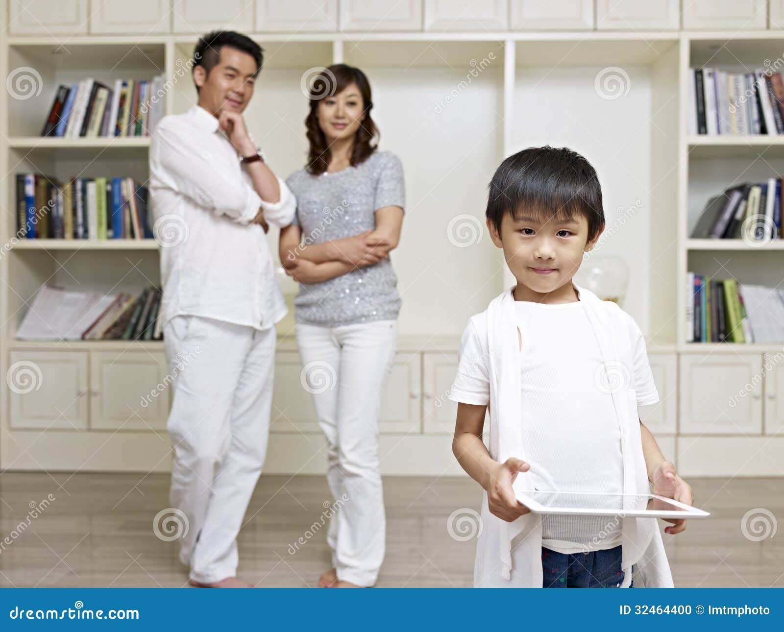 Cute boy and proud parents stock photo. Image of chinese - 32464400