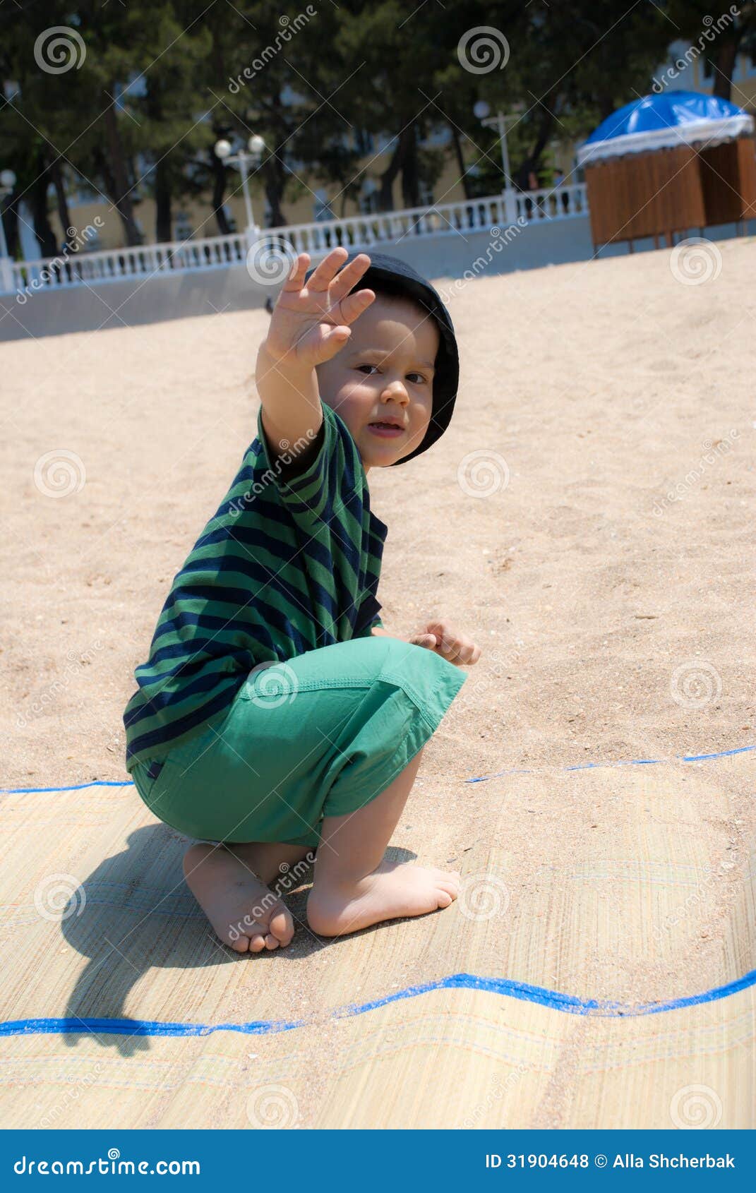 Cute Boy with a Raised Hand in Greeting Stock Photo - Image of ...
