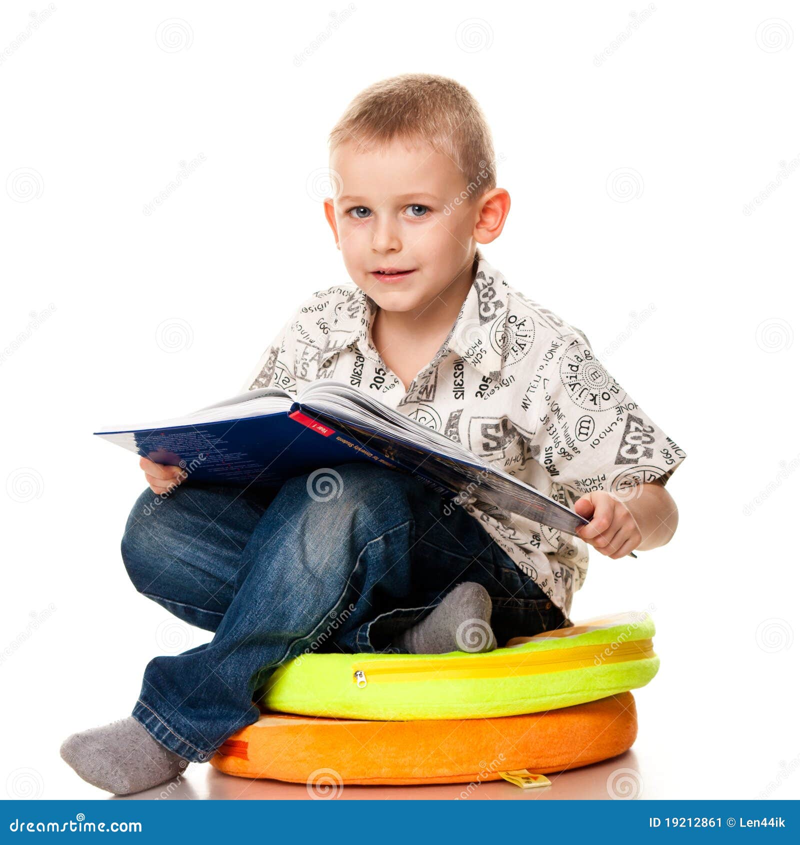 Cute boy reading a book stock image. Image of people - 19212861