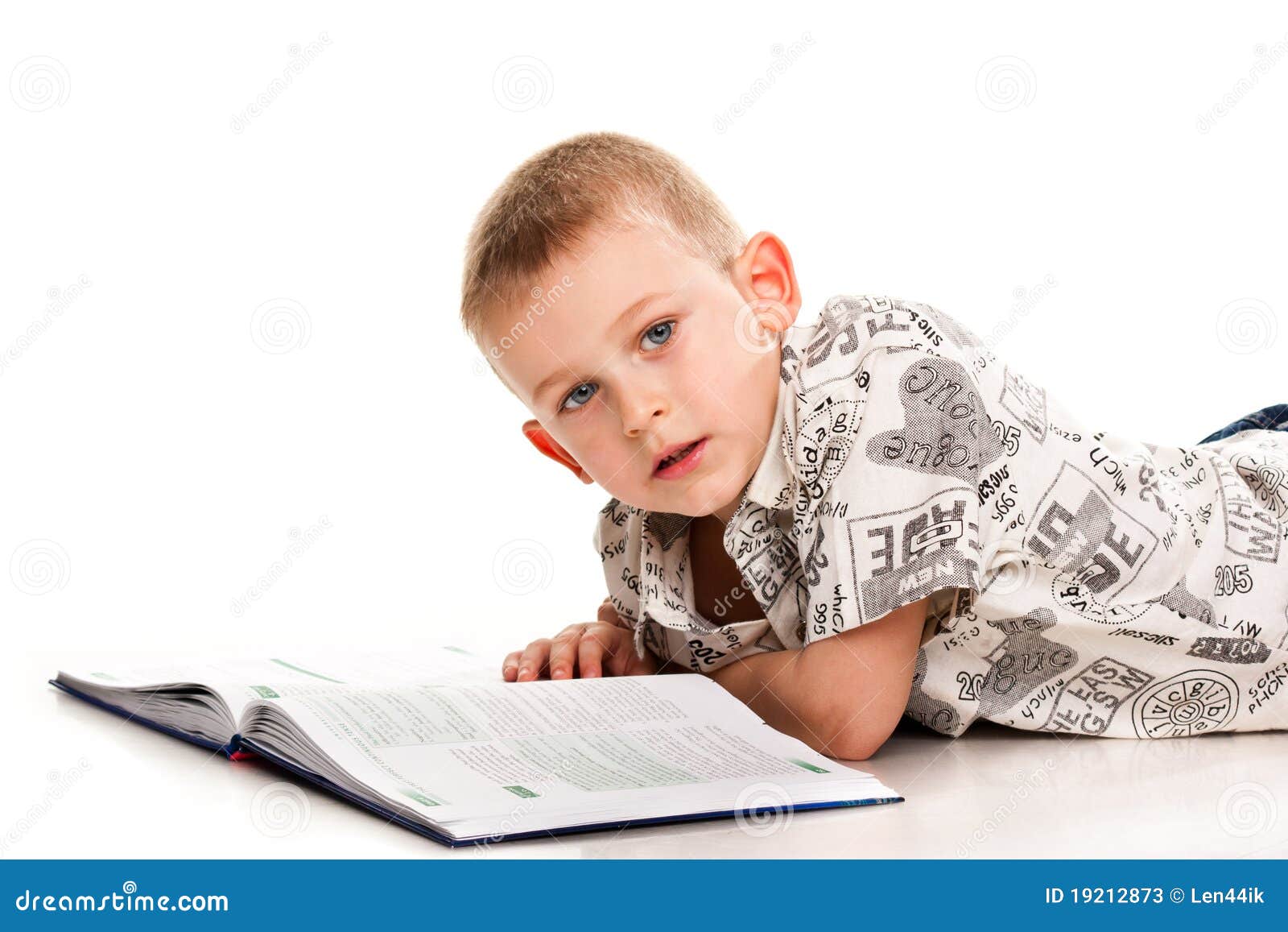 Cute boy reading a book stock image. Image of cheerful - 19212873