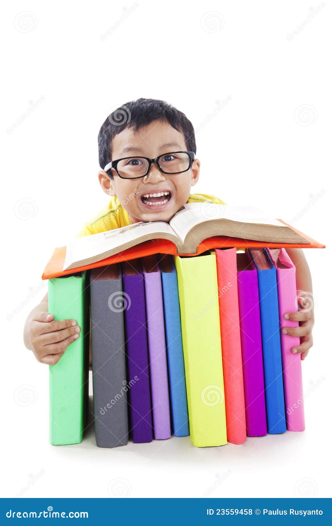 Cute boy reading book stock photo. Image of casual, hold - 23559458
