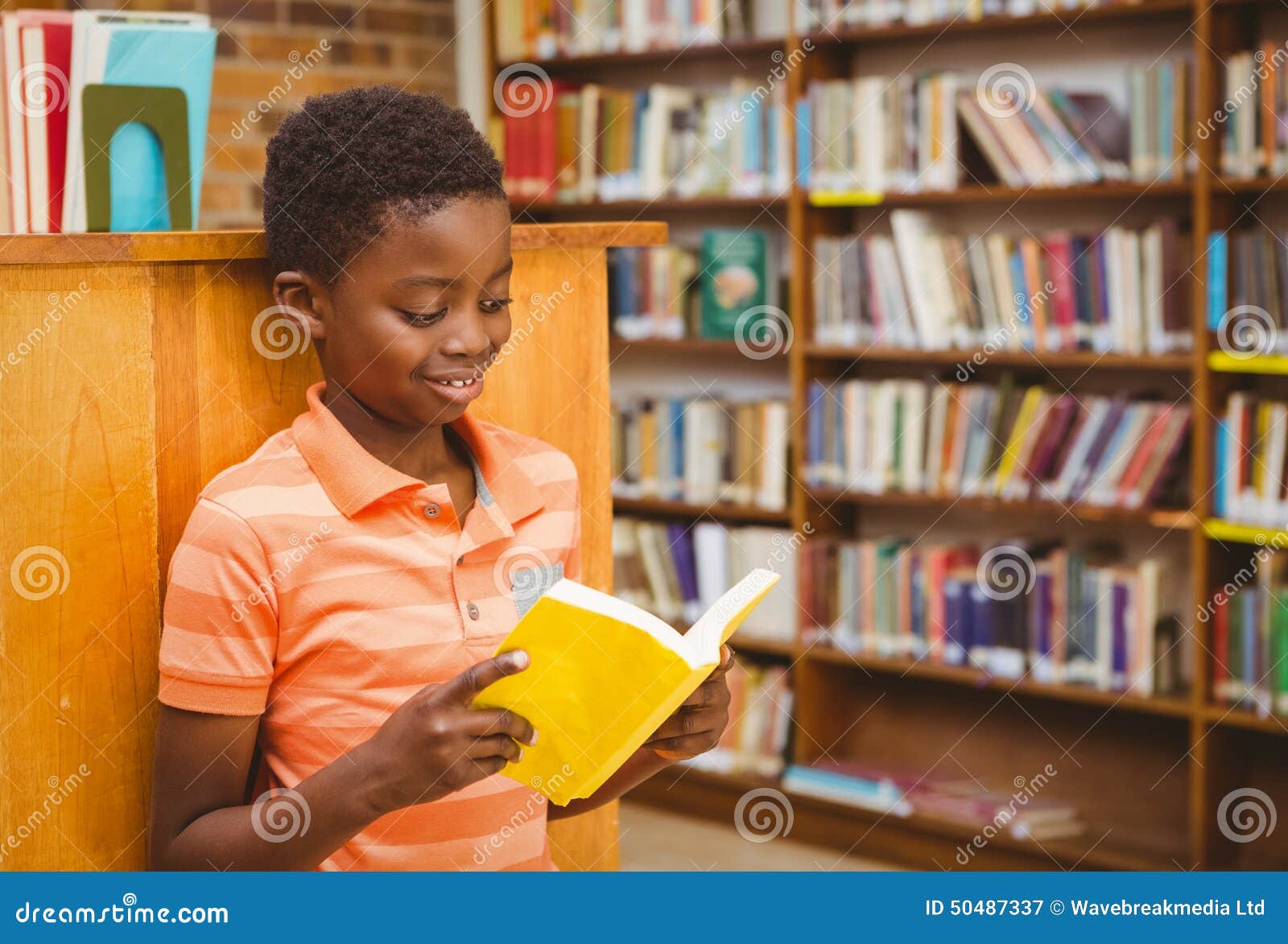 Cute Boy Reading Book in Library Stock Image - Image of learning ...