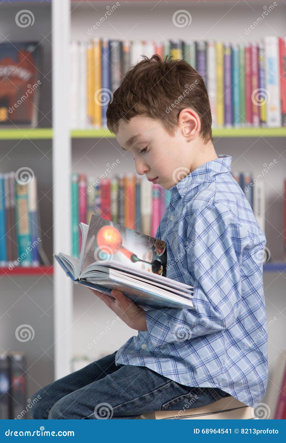 Cute Boy Reading Book in Library Stock Image - Image of learn ...